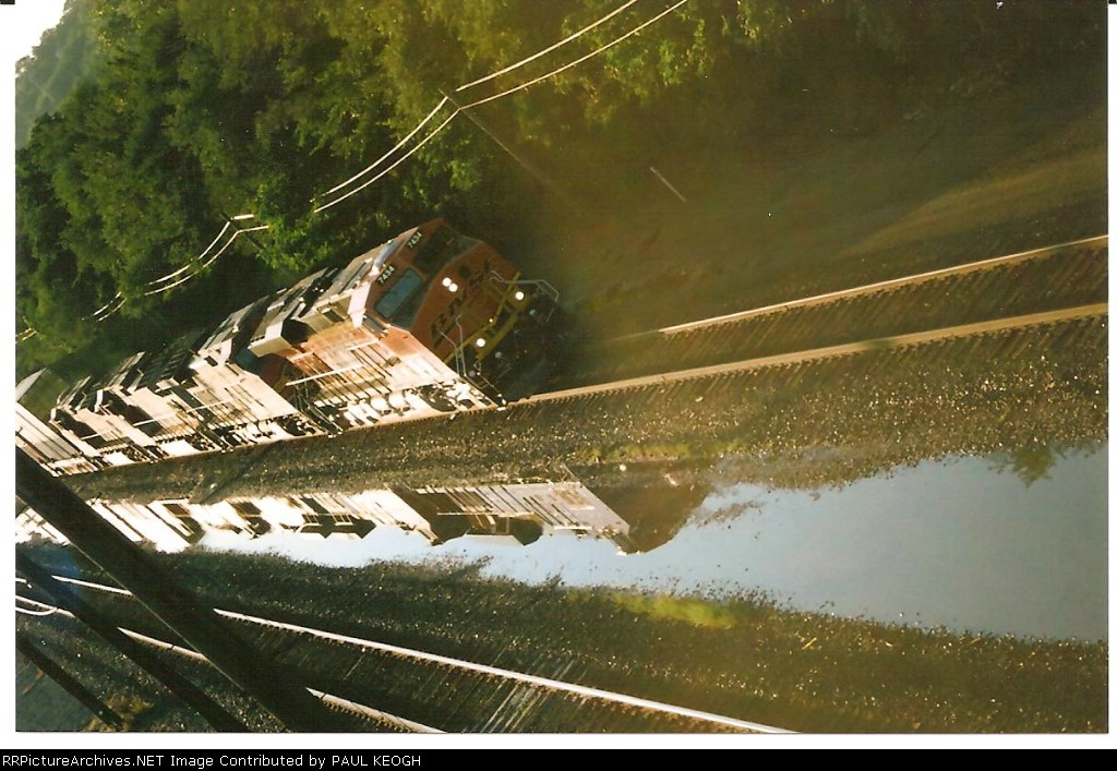 BNSF 7434 rolls west on her maiden run from Erie, Pa